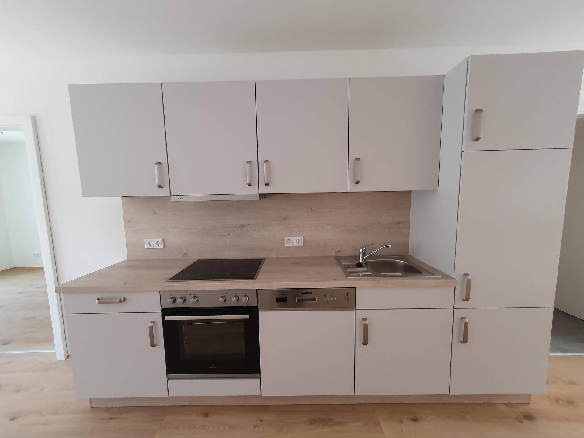 Geförderte Neubauwohnung mit Balkon im 1. Stock